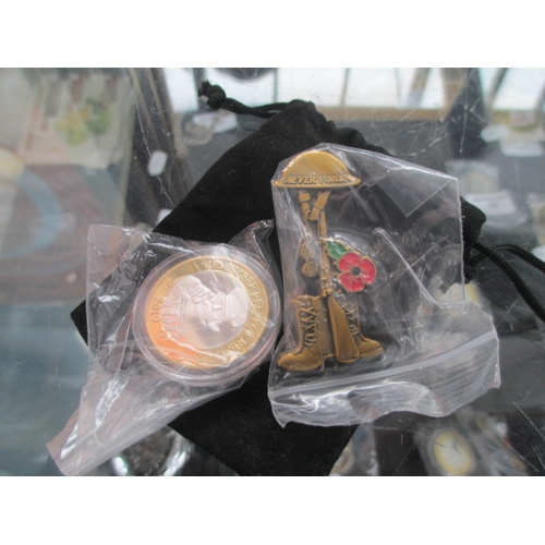 Commemorative Remember, Reflect, Respect coin and Never Forget badge