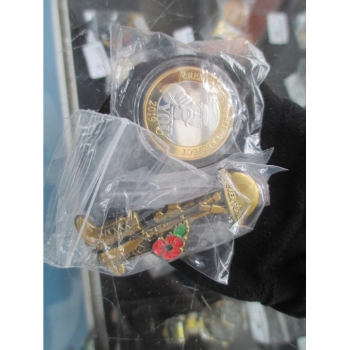 Commemorative Remember, Reflect, Respect coin and Never Forget badge