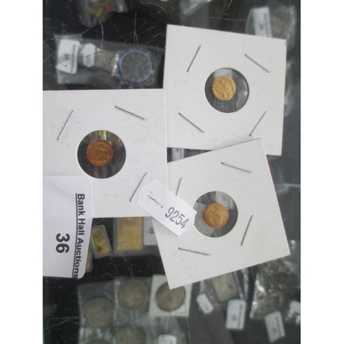 Three miniature coins