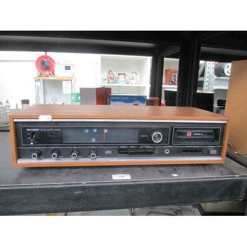 A vintage SHARP radio cassette player