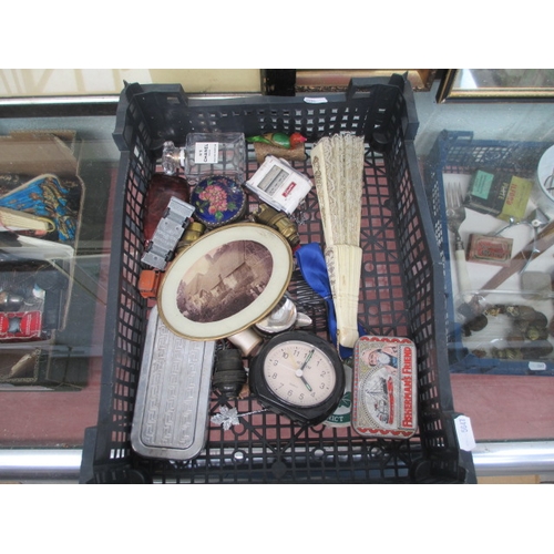 Basket inc hand fan, razor, clock, Chanel bottle, etc