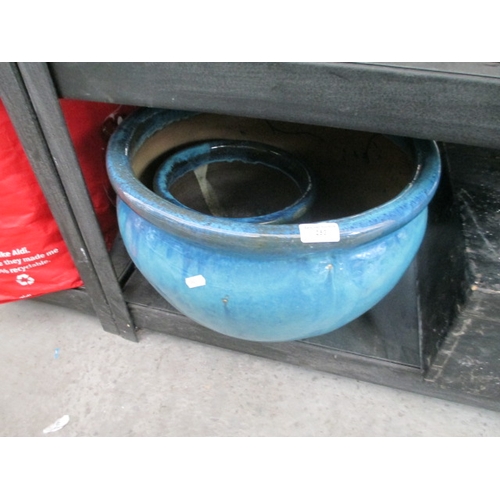 Large and small matching colour plant pots