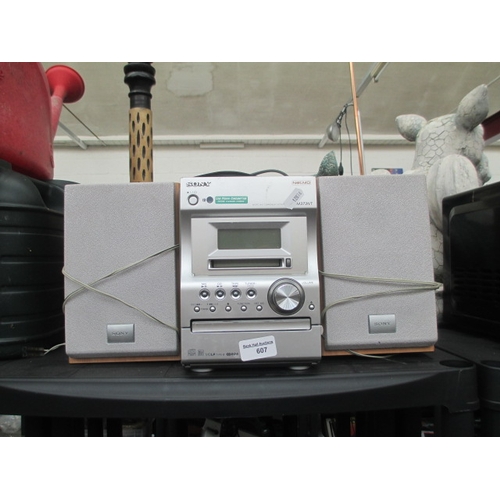 A retro SONY Micro Hi-fi system with speakers, powers up
