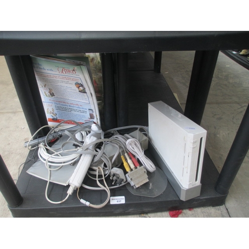 A Wii unit and controls, powers up