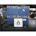 Four Omron mini timer units