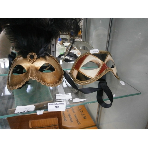 Two hand painted masks