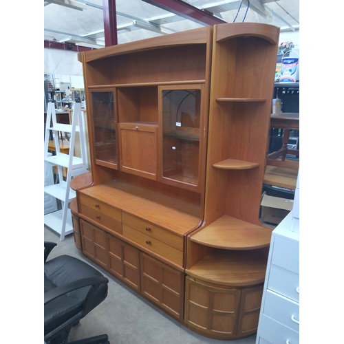 A large retro teak NATHAN wall unit with glazed cabinet, 4 drawer base ...