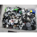 A box of small plastic model figures