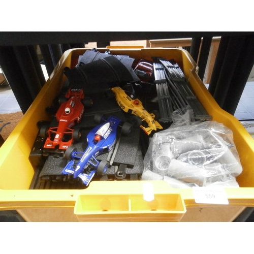 Box of race track with Hornby race cars