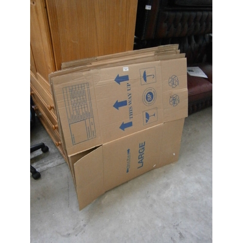 Seven large flat pack boxes