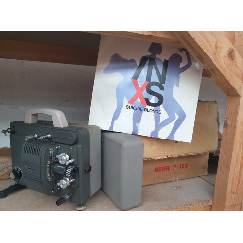 Rexina 8 projector and projector screen with suicide blonde record