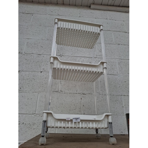 Three tier plastic trolley