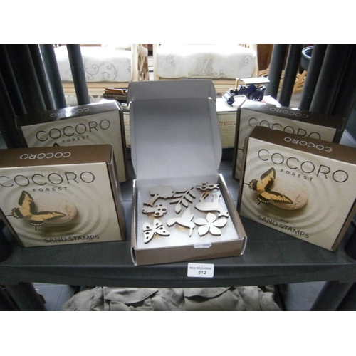 5 boxes of sand stamps