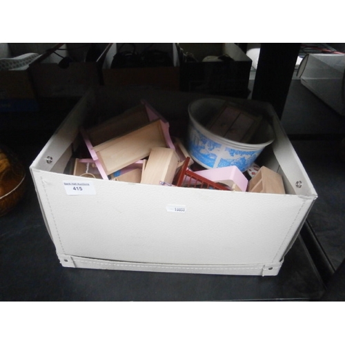 Box of dolls house furniture