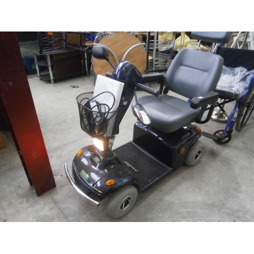 FreeRider mobility scooter with key and battery charger, in working order