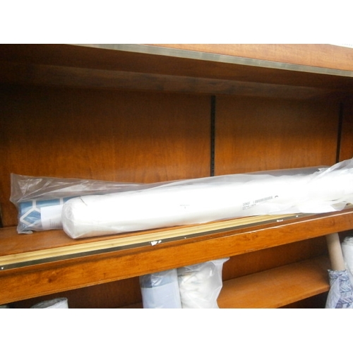 Two rolls of assorted wrapped fabric