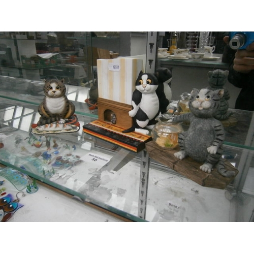 Three Comic Curious Cats ornaments