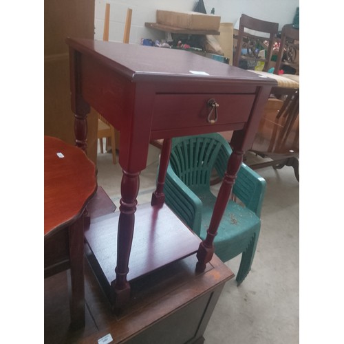 A 2 tier mahogany lamp table stand with drawer