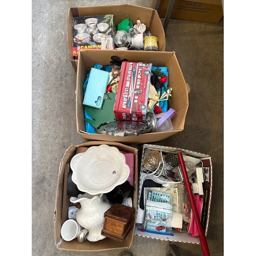 Four boxes of unsorted household items