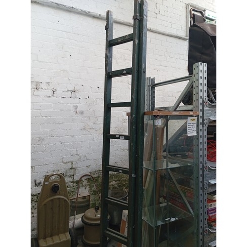Old wooden two tier ladders