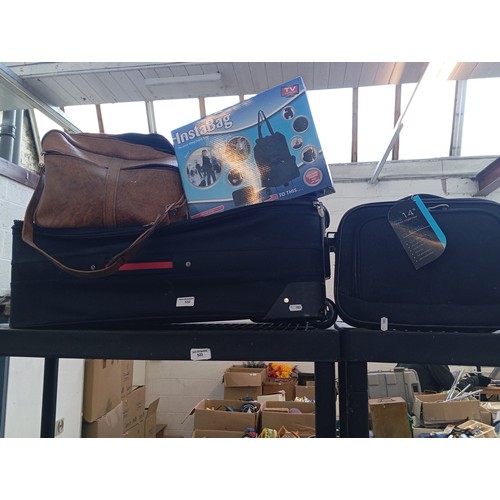 Lot inc suitcase, travel organiser, travel instabag and leather bag