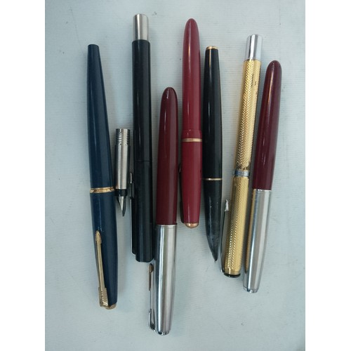 Seven old fountain pens