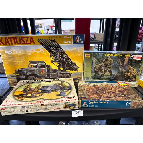Four military model kits