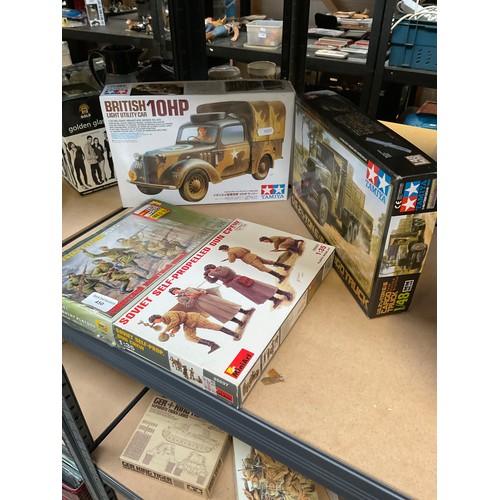 Four military model kits