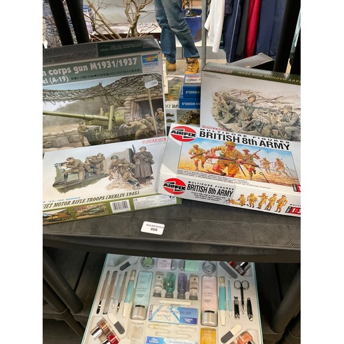 Four military model kits