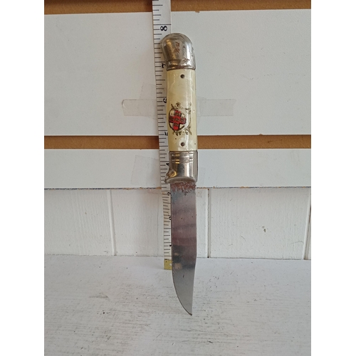 Knife with Crest On Handle
