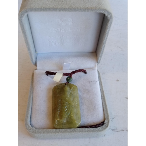 Jade Amulet in Case