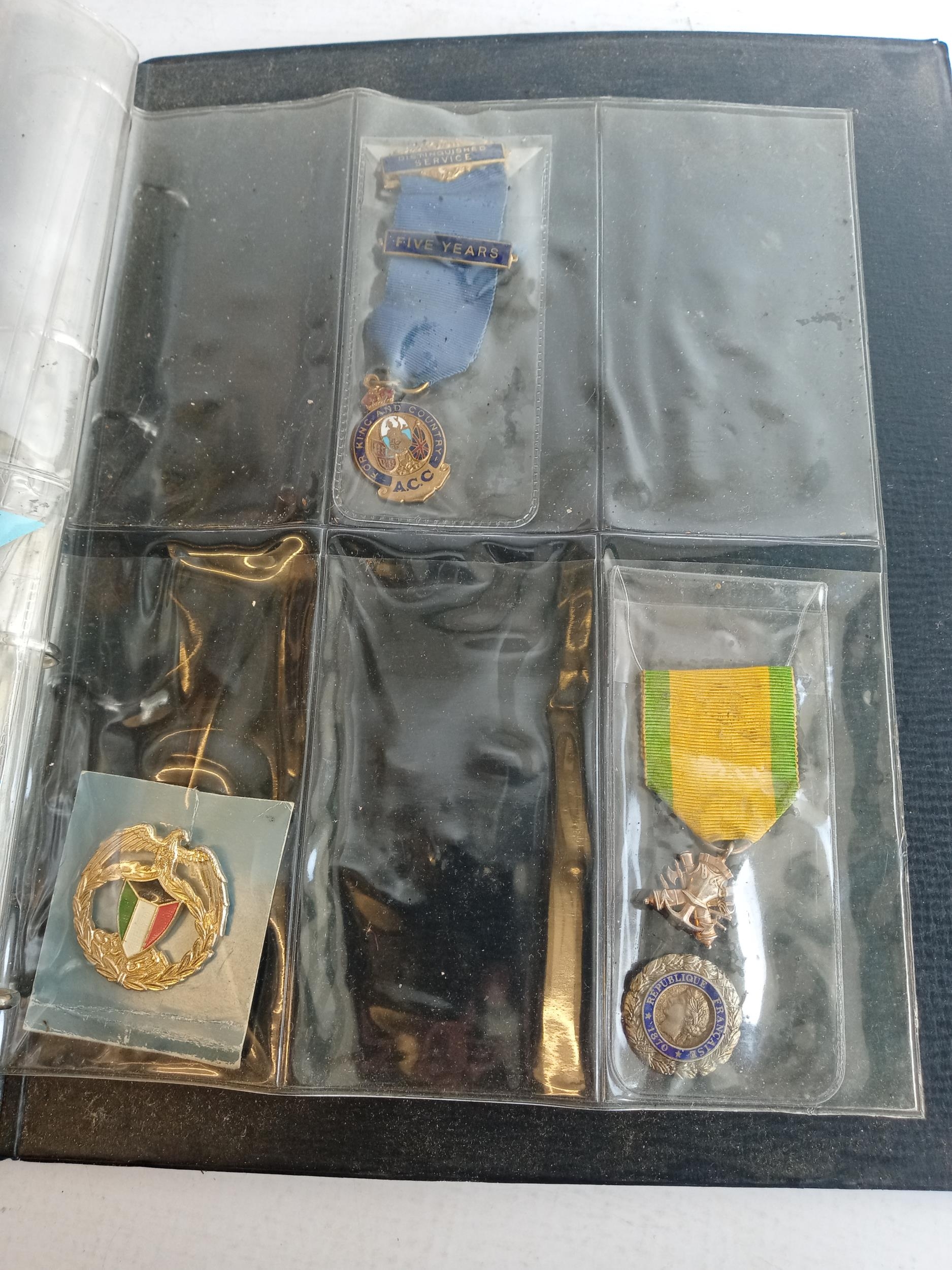Folder of approx 16 Assorted Military Medals