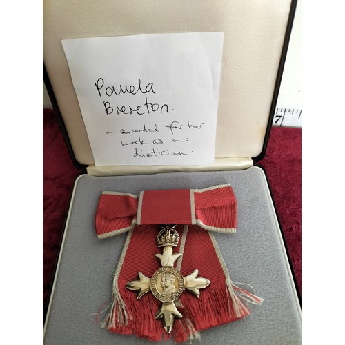 Original MBE medal with case and named