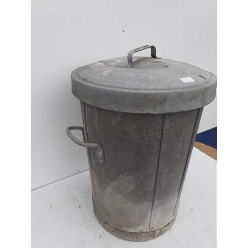 A HEAVY VINTAGE GALVANISHED DUSTBIN