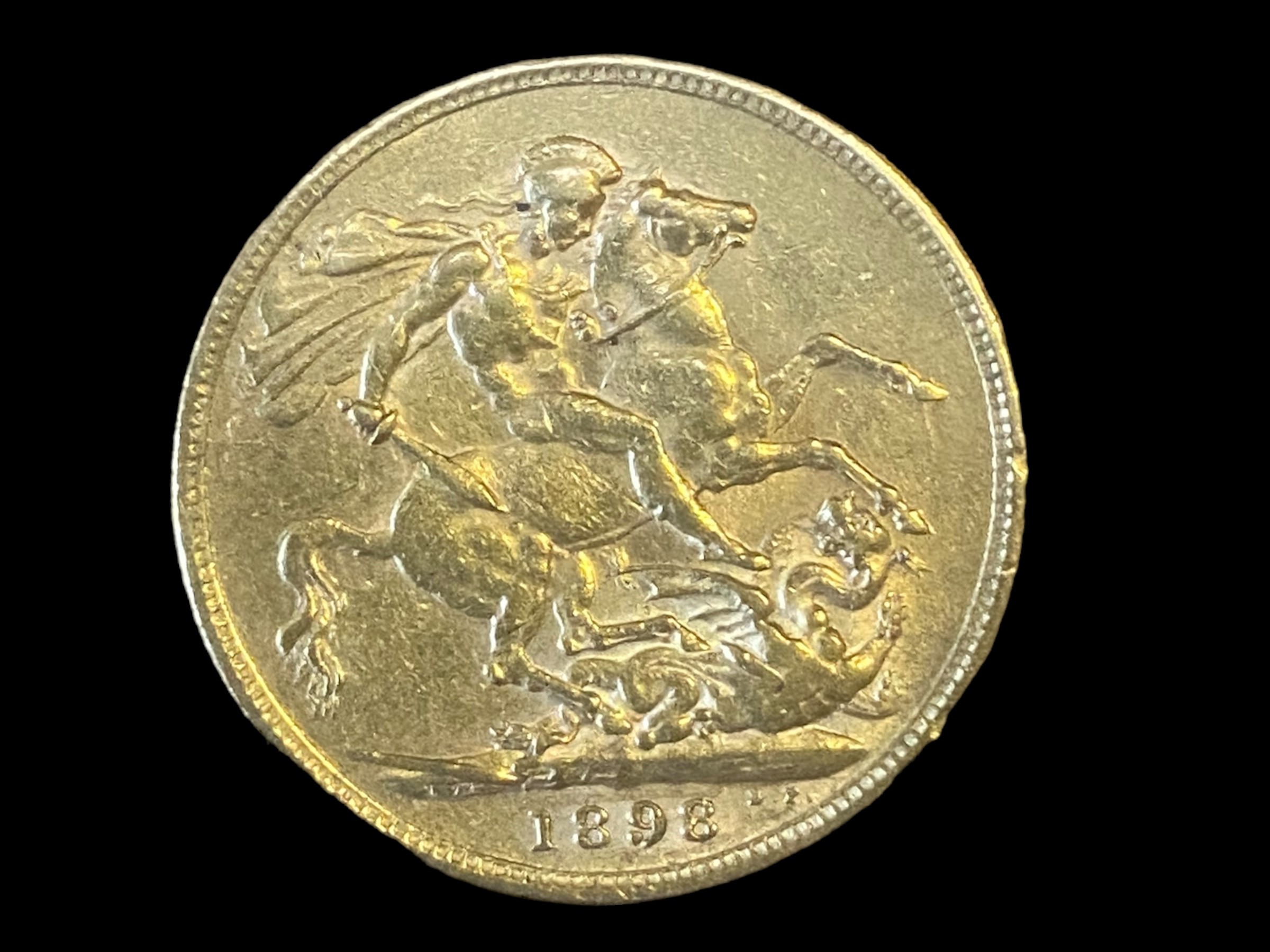 A 1898 SOVEREIGN COIN