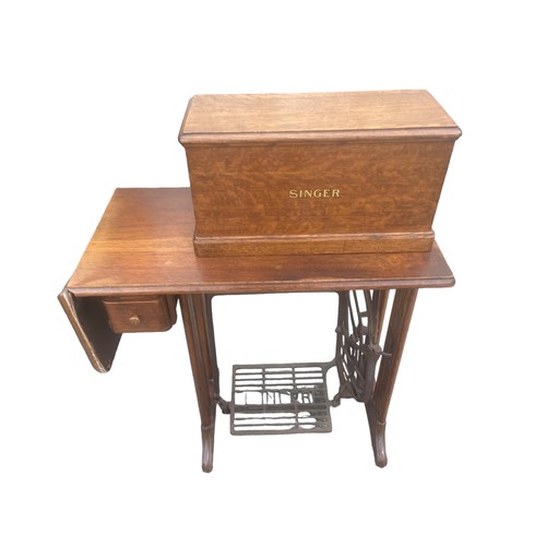 A FULLY RESTORED ORIGINAL SINGER SEWING MACHINE ON AN ORIGINAL OAK BASE ...