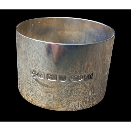 A SET OF 6 SHEFFIELD SILVER NAPKIN RINGS DATED 1999 WITH THE MILLNIUM ...