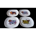 A SET OF 4 BEEFEATER RETRO PLATES