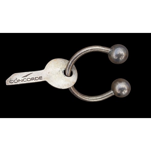 A COLLECTABLE SILVER CONCORDE KEY AND RING WTH FULL HALLMARKS