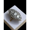 A TRULY STUNNING 18CT SHEILD SHAPED DIAMOND RING OF EXCEPTIONAL QULAITY