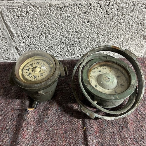 Two Small Ships Compasses. Size: Largest W:20cm D:20cm H:10cm.