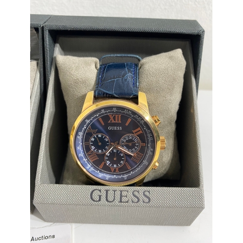 Two Guess Watches in boxes