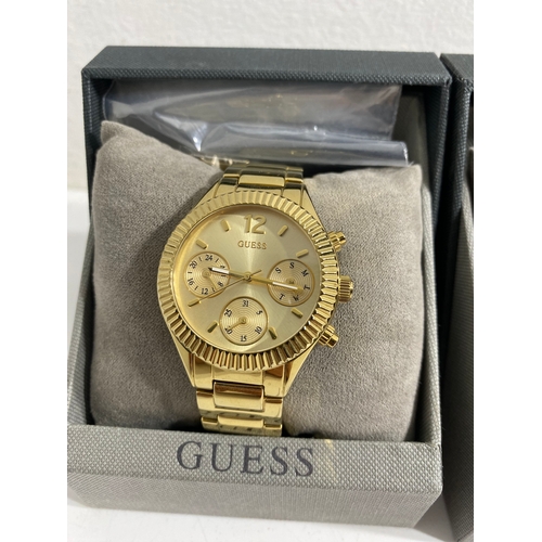 Two Guess Watches in boxes