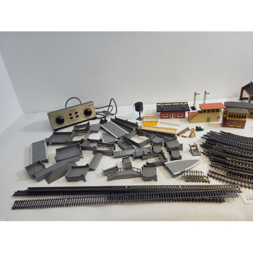 Collection of Triang trains tracks, buildings and accessories including ...