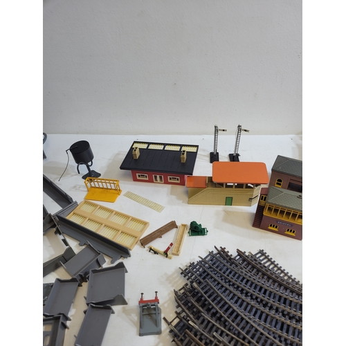 Collection of Triang trains tracks, buildings and accessories including ...