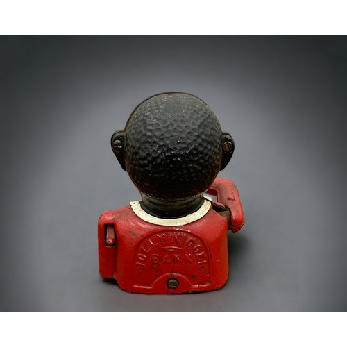 A VINTAGE CAST IRON 'JOLLY' MONEY BANK. "These items are listed on the ...