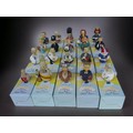 A LOT OF 20 BOXED EGGBERT & FRIENDS FIGURINES. BY MALCOLM BOWMER.