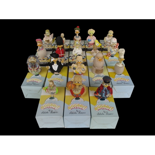 A LOT OF 18 BOXED EGGBERT & FRIENDS FIGURINES. BY MALCOLM BOWMER.