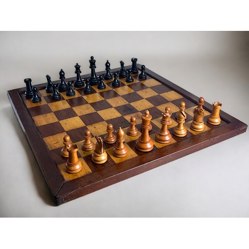 A large Victorian Chess set.Mahogany board by the British Chess Co ...