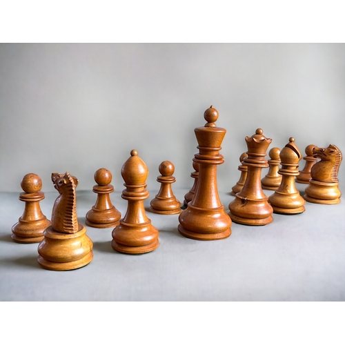 A large Victorian Chess set.Mahogany board by the British Chess Co ...